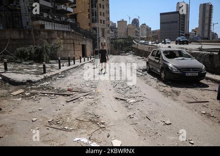 Damaged cars are seen the day after a massive explosion at the port on ...