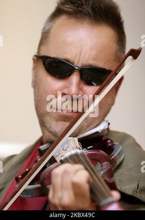 English Violinist Nigel Kennedy and his trio perform at room their Asia ...