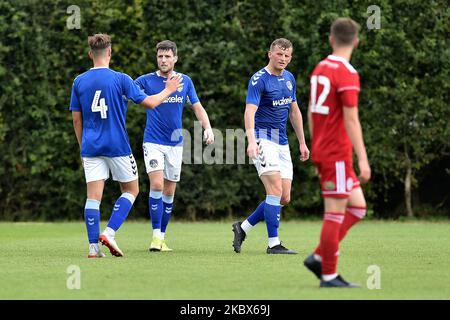 Oldham Athletic's Bobby Grant is congratulated after scoring during the ...