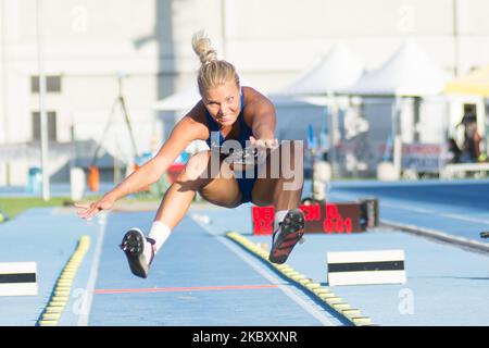 Dariya Derkach competes in the Women's Triple Jump during the Italian ...
