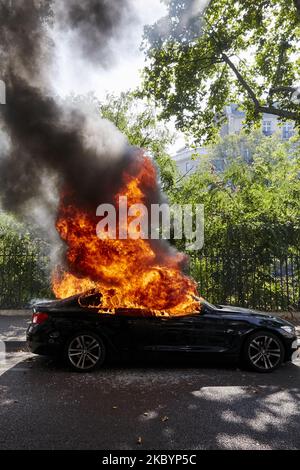 Car burn during a yellow vests movement protests in Paris, France on ...