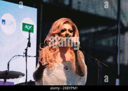 Singer Marcella Rockefeller sings during the outdoor concert held at ...