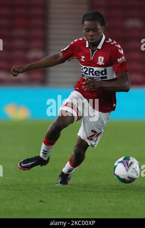 Middlesbrough's Sam Folarin in action dwith Barnsley's Marcel Ritzmaier ...