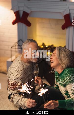 Christmas Eve. happy bearded man hipster wear red festive elf costume ...