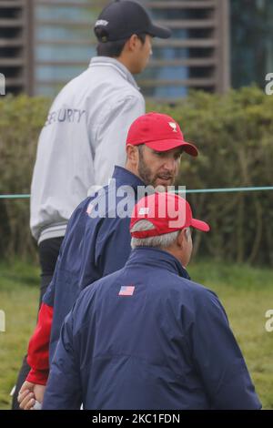 United States Team Player Dustin Johnson practice putting shot near ...