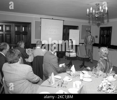 1980s, historical, management training, in a hotel conference room ...
