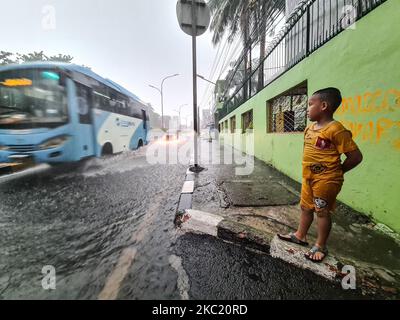 View of streets in Jakarta, Indonesia covered with water as heavy rain ...