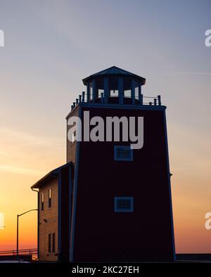 A vertical shot of a lighthouse during a sunset Stock Photo - Alamy
