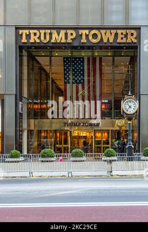 The main entrance of Trump Tower with the inscription on it and a US ...