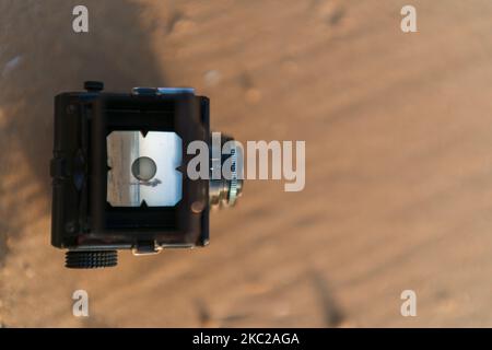 A top view of a black twin-lens reflex camera on the sand Stock Photo ...