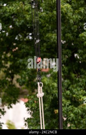 Pulley and rope system at the base of the mast for sail installing on ...
