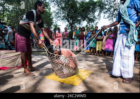 Two people performing Street magic at Tehatta, Nadia, West Bengal ...