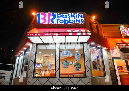 Dunkin' Donuts sign at their Woodside, Queens. Dunkin Donuts / Baskin ...