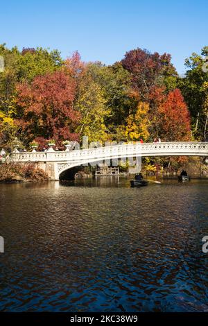 Bow Bridge and fall colors in Central Park with Manhattan Upper West ...