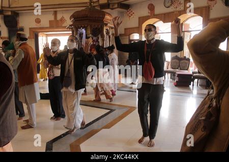 Devotees dancing and singing inside Iskcon temple during the 'Govardhan ...