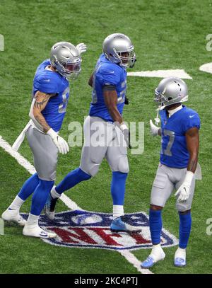 Detroit Lions wide receiver Isaac TeSlaa (18) makes a one-handed catch ...