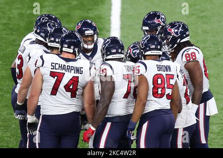 Houston Texans huddle during the second half of an NFL football AFC ...