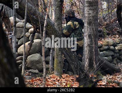 A soldier guards a polling station during the presidential runoff ...