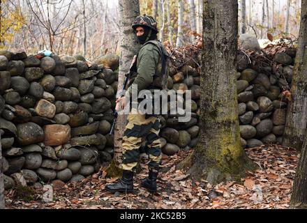 A soldier guards a polling station during the presidential runoff ...