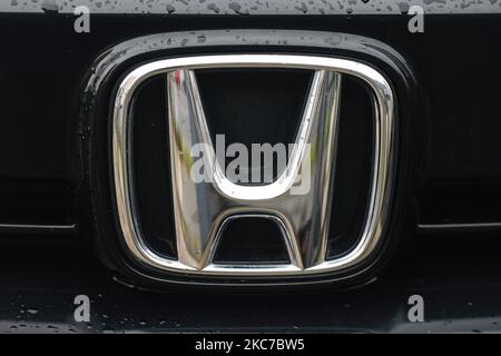 A Honda logo seen on a parked car in Dublin city center. On Tuesday ...