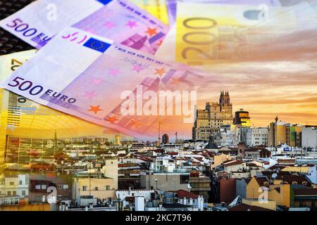 Euro cash banknotes and skyline of Madrid city, Spain (real estate ...