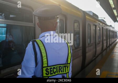 Security guard of LRT-2 in Santolan Station, Pasig City wearing face ...