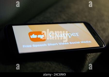 In this photo illustration the Clapper logo seen displayed on a ...