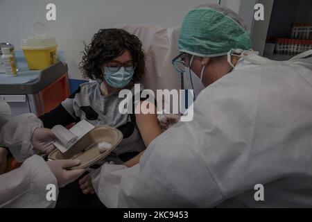 Firsts people receiving the AstraZeneca vaccine in Pisa, Italy, on ...