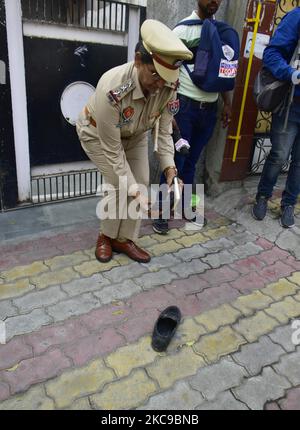 AMRITSAR, INDIA - NOVEMBER 4: Police personnel investigate the crime ...