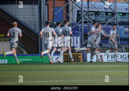 Burton Albion players celebrate their opening goal during the Sky Bet ...