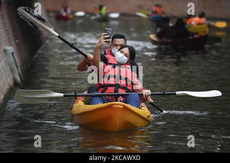 People go kayaking at Khlong Ong Ang. The historical canal in central ...