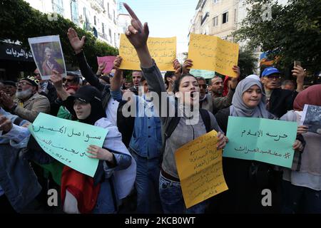 Algerian demonstrators take part in an anti-government demonstration in ...