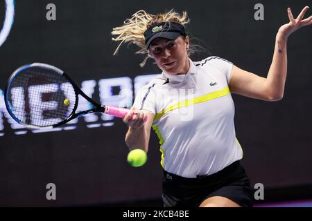 Anastasia Gasanova of Russia returns the ball during the second round ...