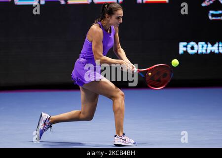 Anastasia Gasanova of Russia returns the ball during the second round ...