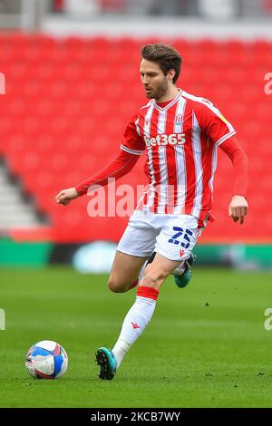 Nick Powell #25 of Stoke City in action during the game in, on 3/6/2021 ...