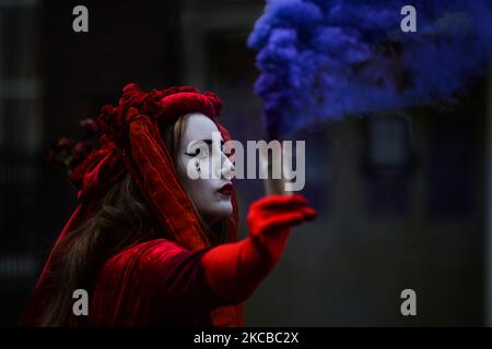 A group of anti-fracking campaigners and activists protesting outside ...