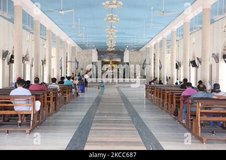 Devotees pray at the Annai Velankanni Church (Basilica of Our Lady of ...