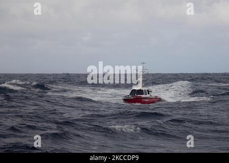 An ST Engineering vessel equipped with the AUTONOMAST system, conducts ...