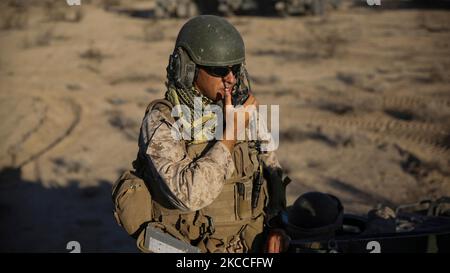 U.S. Marines with 3rd Marine Regiment, 3rd Marine Division shave off ...