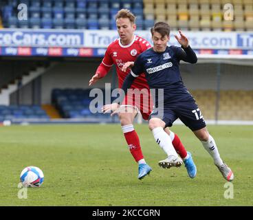 L-R Jordan Maquire-Drew of Crawley Town and Nathan Ferguson of Southend ...