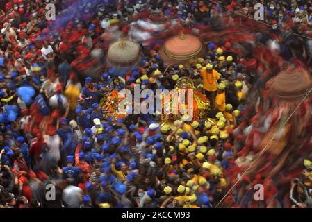 Nepalese devotees carrying the chariot and rotate during the ...