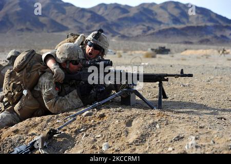 U.S. infantry machine gun platoon moving inland from Utah Beach on June ...