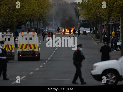 Loyalists burn bins and furniture during a protest on Lanark Way, near ...