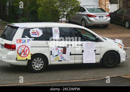 Hasidic Jews hold a vehicle parade through a Jewish neighbourhood to ...