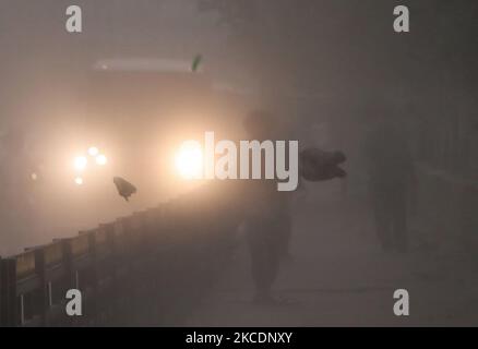 Commuters during sand storm in Guwahati, Assam, India on Saturday, 01 ...