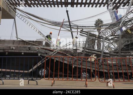 Emergency work zone after a column collapsed on the night of May 3 ...