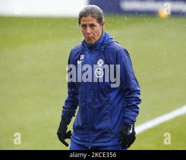 Chelsea assistant coach Denise Reddy oversees the warm up prior to kick ...