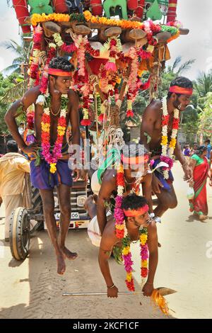 Tamil Hindu devotees perform the para-kavadi ritual while on route to ...