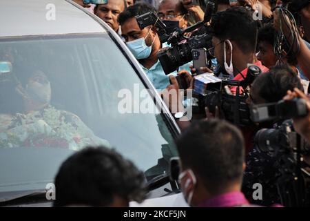 Investigative journalist Rozina Islam sits inside a car after she was ...
