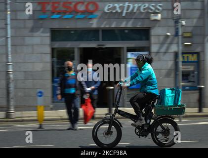 A Deliveroo currier seen in Dublin city center, during the COVID-19 ...